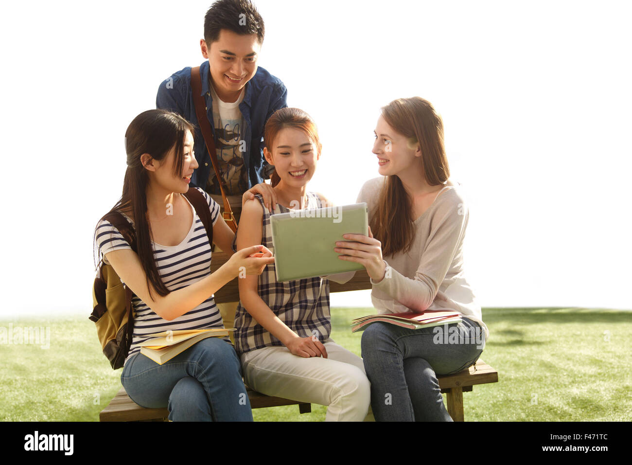 Young people with digital tablet Stock Photo - Alamy