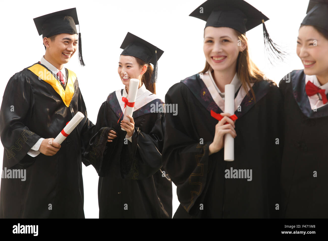 Students in graduation clothing Stock Photo - Alamy