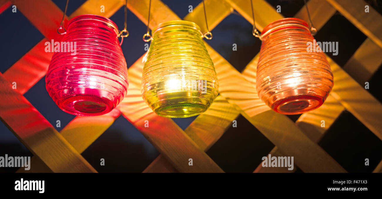 Hanging colorful tea lights Stock Photo - Alamy