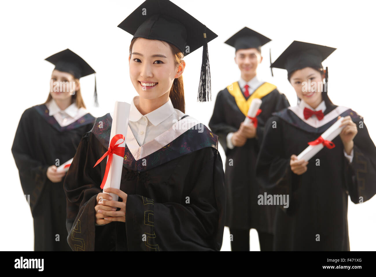 Students in graduation clothing Stock Photo - Alamy