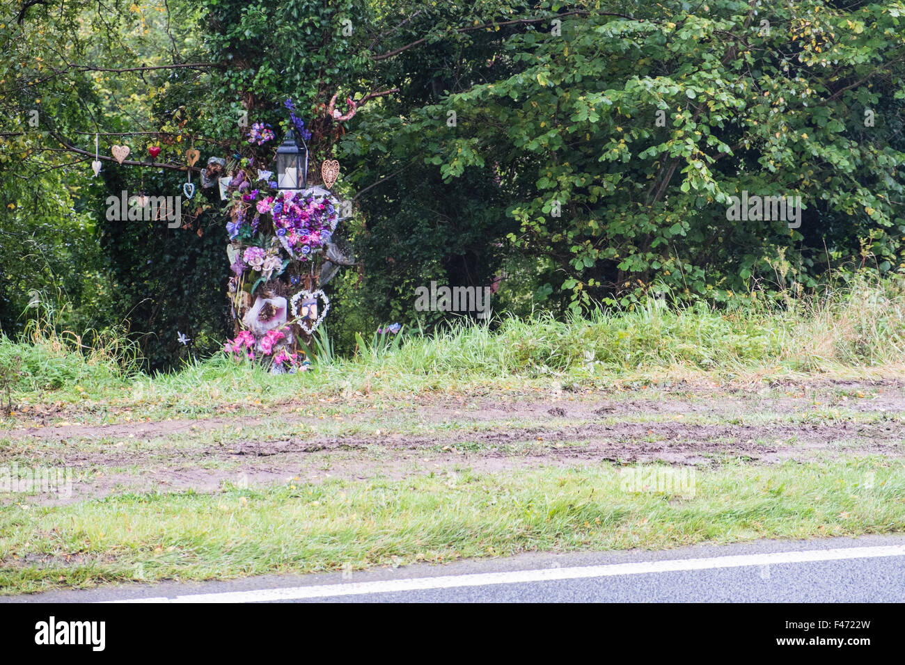 Flowers and other objects laid by grieving friends,relatives at ...