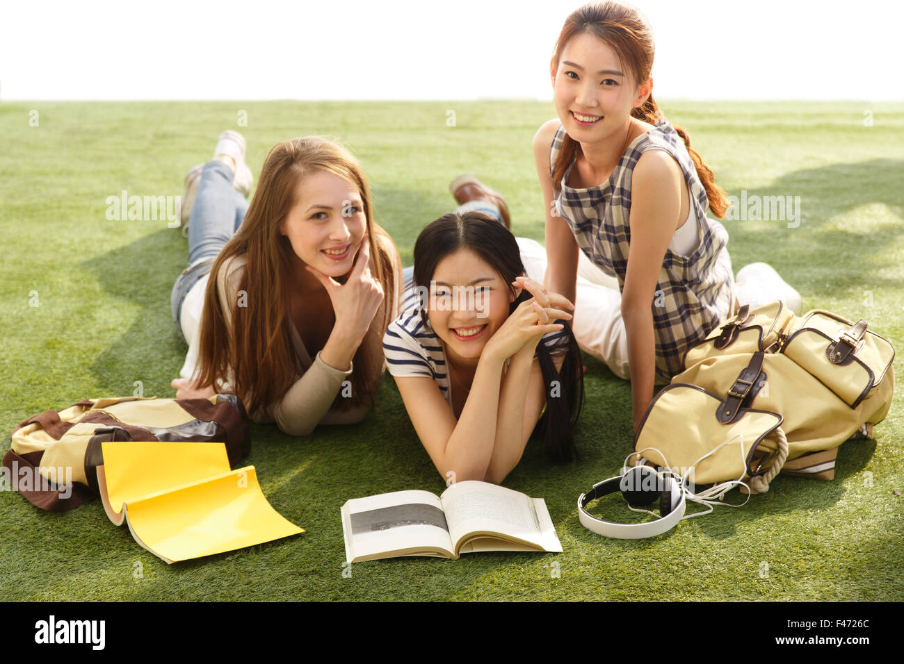 Reading on lawn hi-res stock photography and images - Alamy