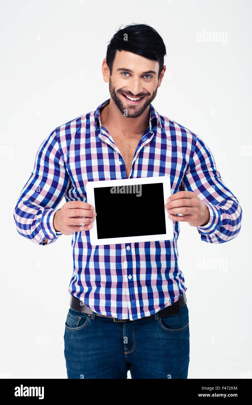 Portrait of a smiling man showing tablet computer screen isolated on a ...