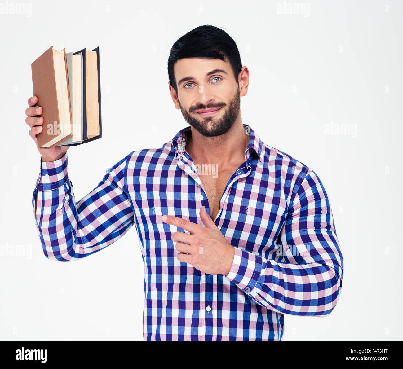 Portrait of a handsome man holding books isolated on a white background ...