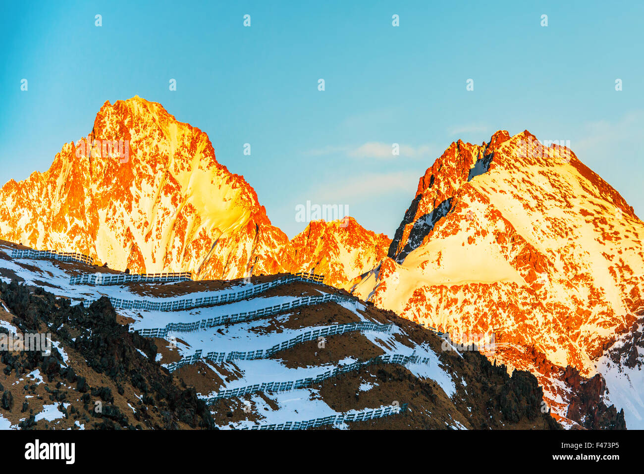 Sunset in mountains Stock Photo - Alamy