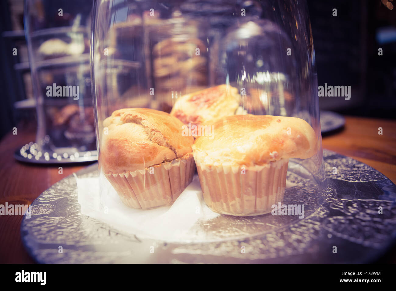Cakes in display cases Stock Photo - Alamy