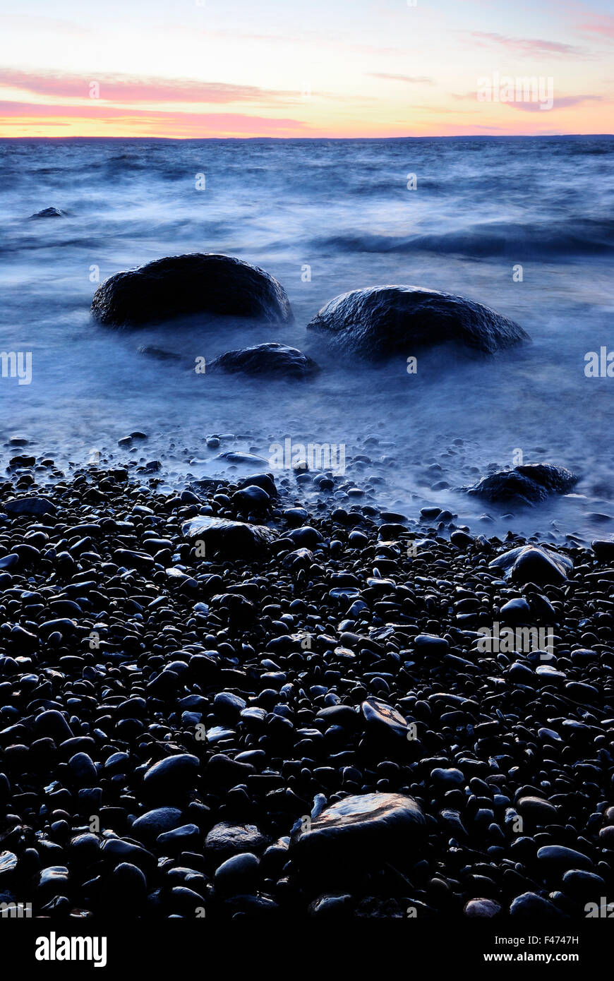 Pebble beach, Vattern, Sweden Stock Photo - Alamy