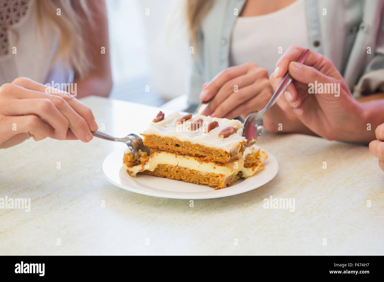 Friends Sharing Cake High Resolution Stock Photography and Images - Alamy
