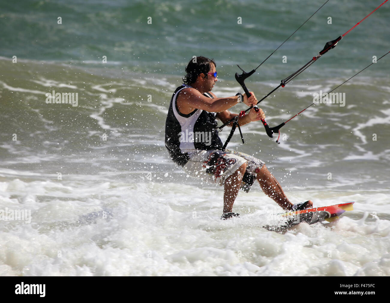 Kitesurfer in action Stock Photo - Alamy