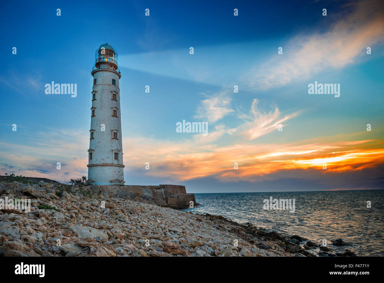Lighthouse at night Stock Photo - Alamy