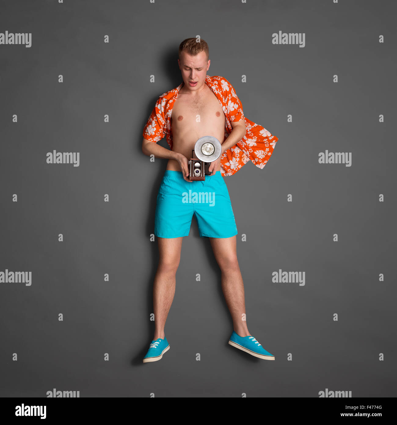 Holding camera flash hi-res stock photography and images - Alamy