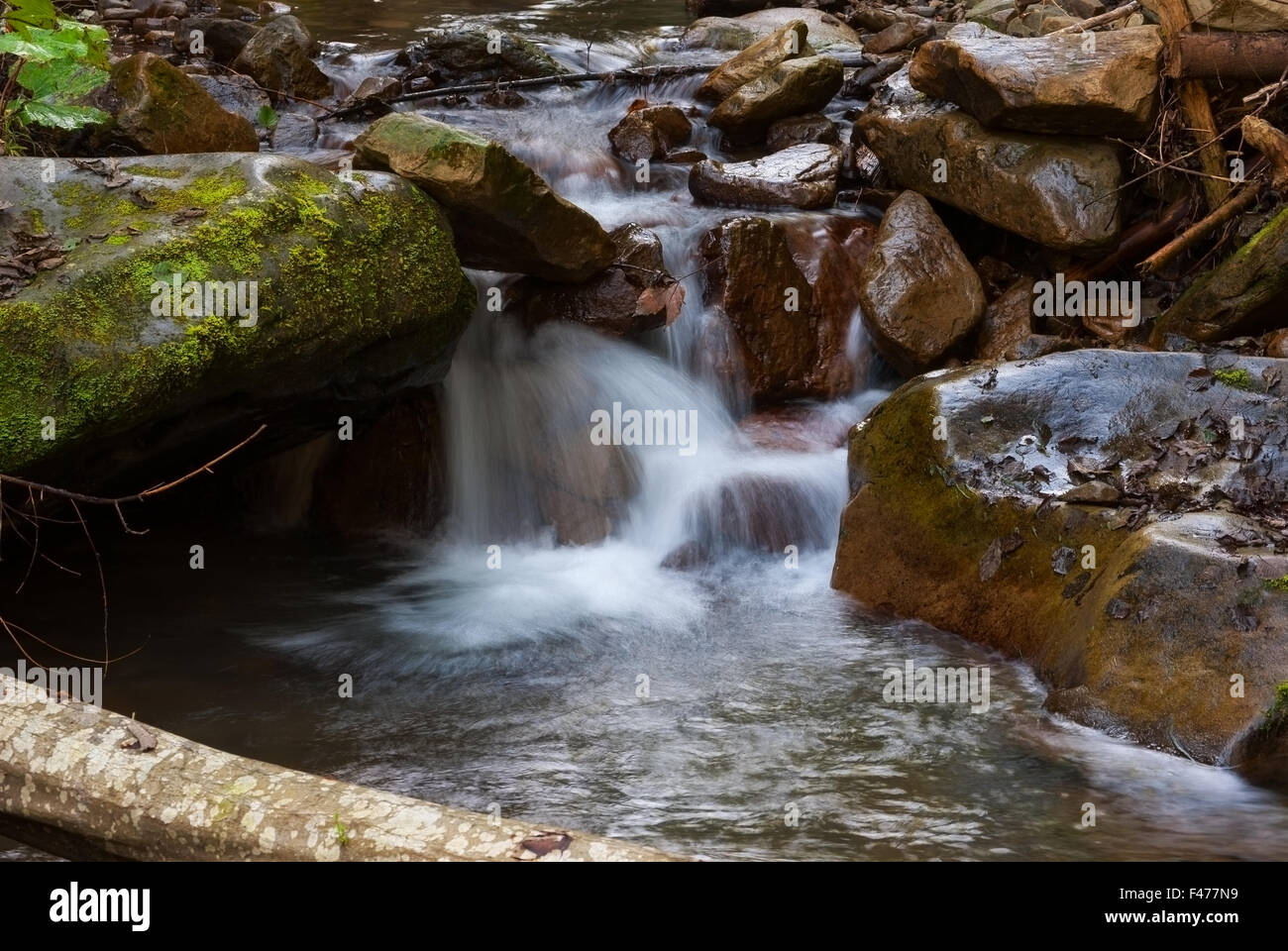 Mountain stream among rocky stones hi-res stock photography and images ...