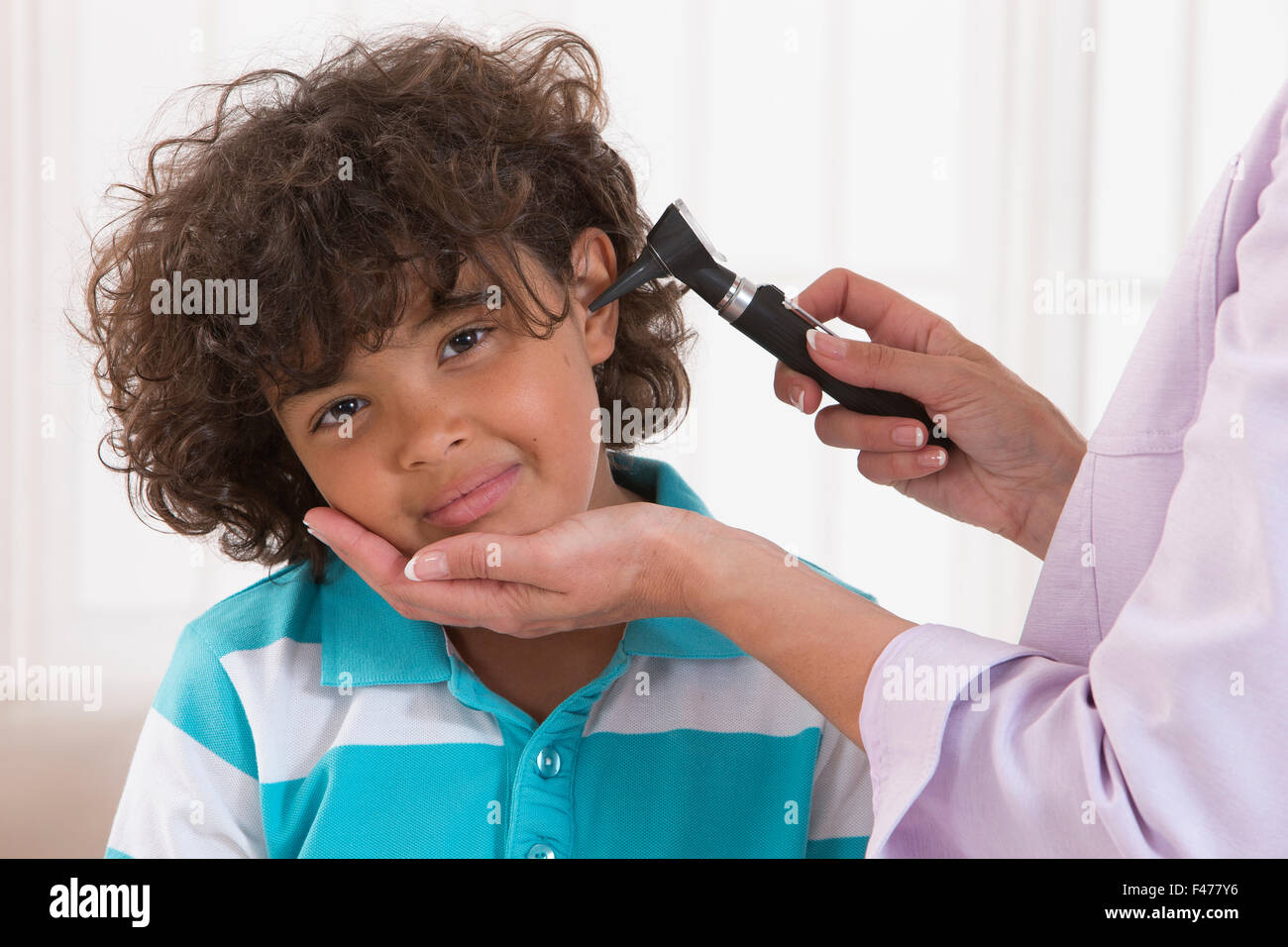 Examining child nose hi-res stock photography and images - Alamy