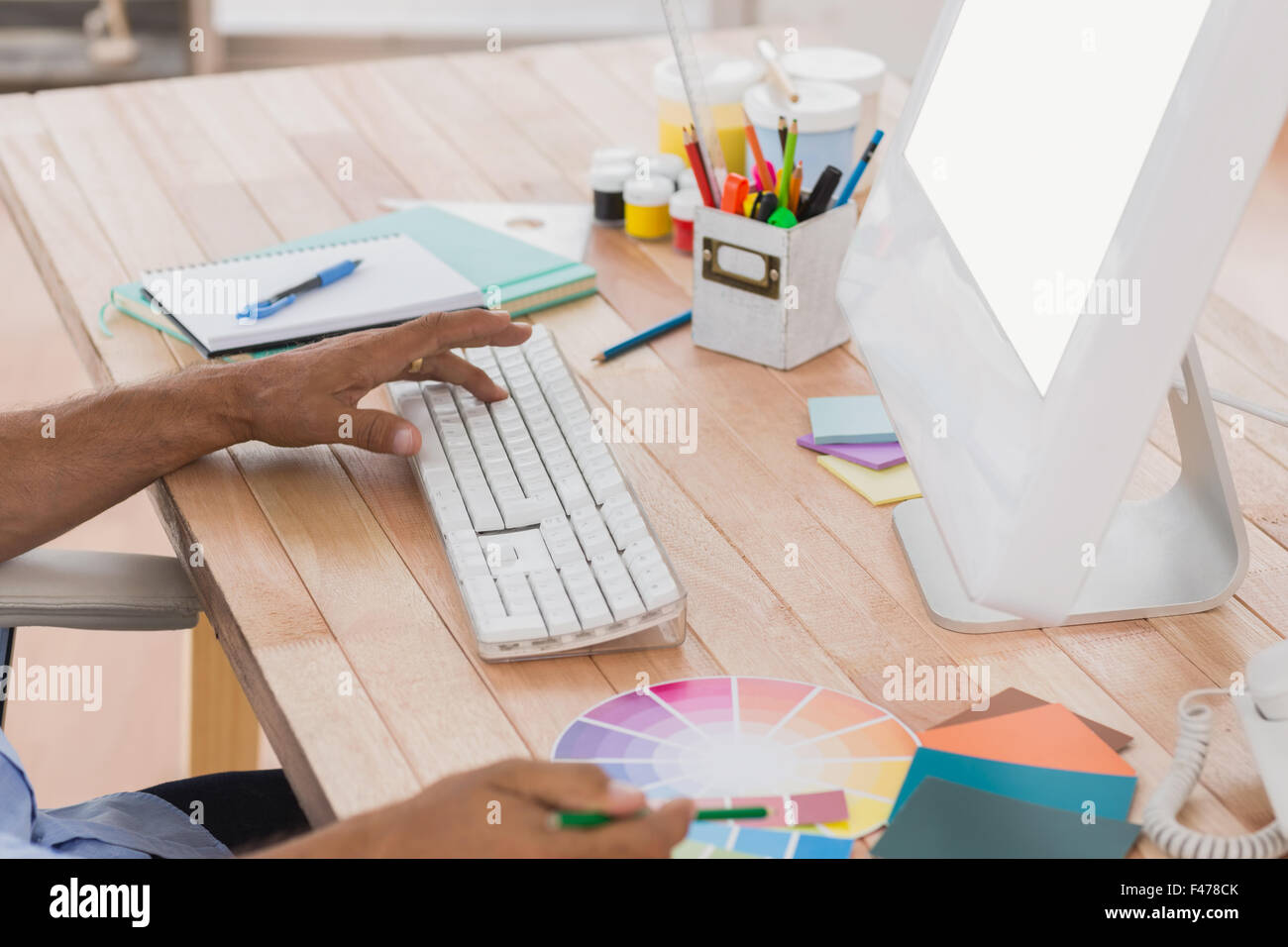 Creative businessman typing on computer Stock Photo - Alamy