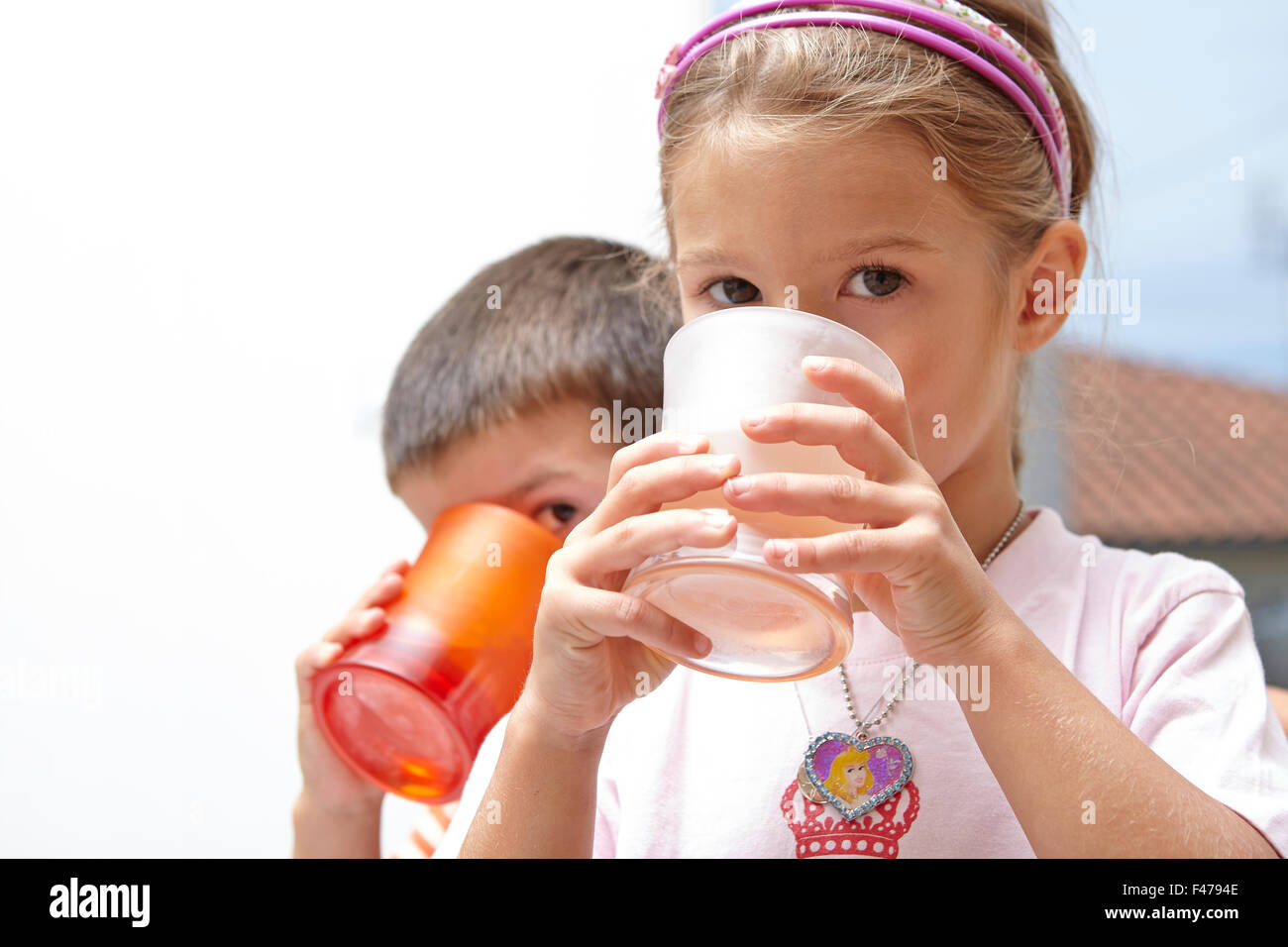 CHILD WITH COLD DRINK Stock Photo - Alamy