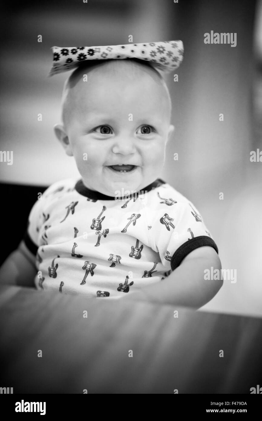 A small child with a napkin on his head, Sweden Stock Photo - Alamy
