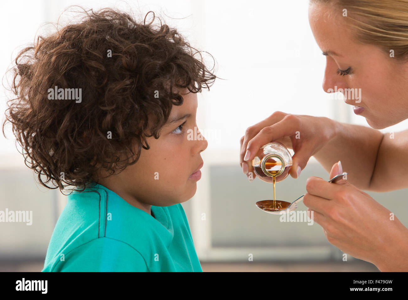Mother child cough syrup hi-res stock photography and images - Alamy