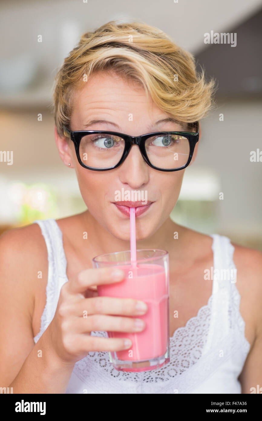 Woman sipping milkshake hi-res stock photography and images - Alamy