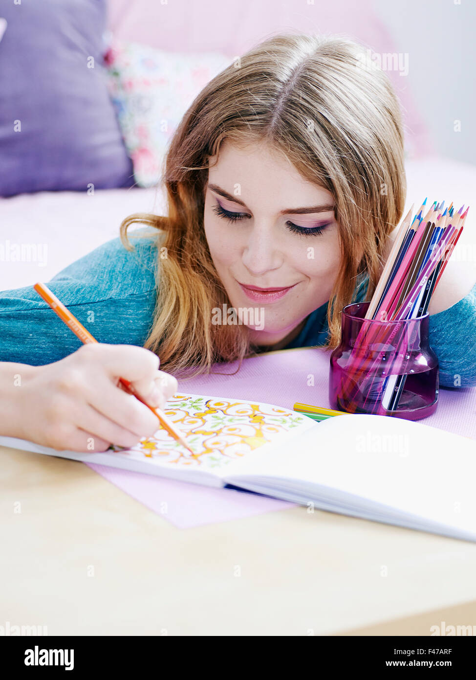Colouring pencils and woman hi-res stock photography and images - Alamy