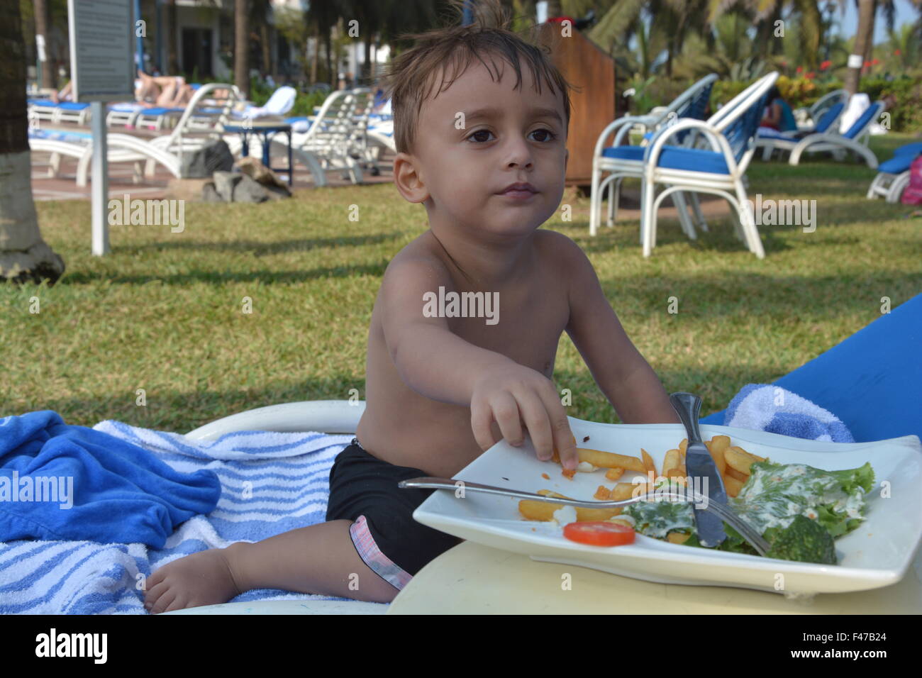 Boy stealing food hi-res stock photography and images - Alamy