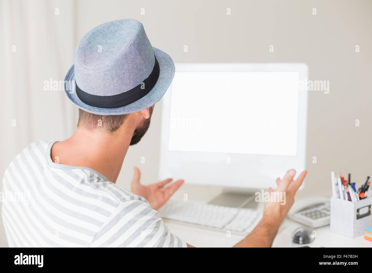 A serious handsome man working Stock Photo - Alamy