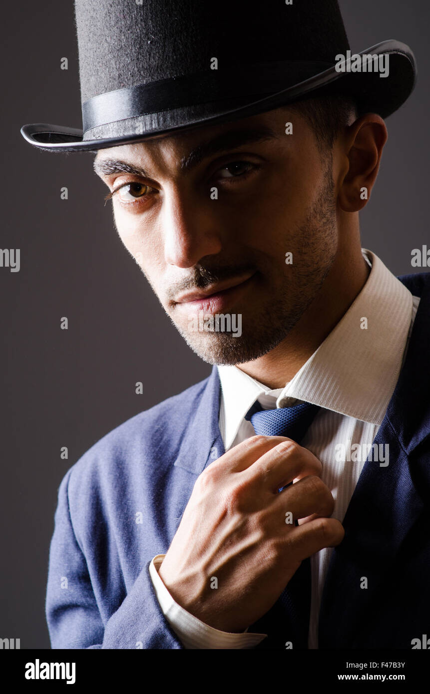 Man with hat in vintage concept Stock Photo - Alamy