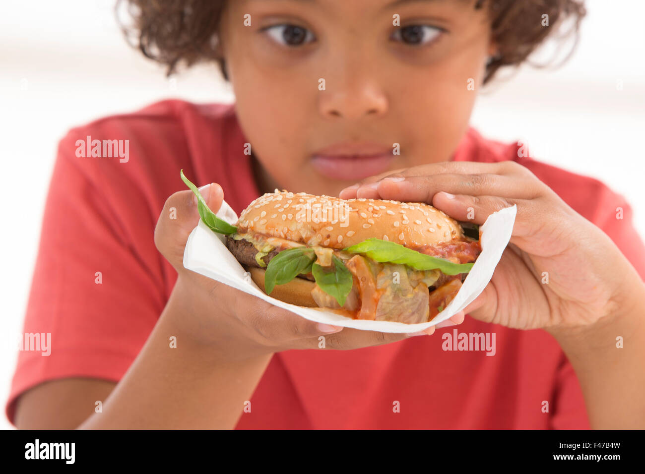 Obese children eating fast food hi-res stock photography and images - Alamy
