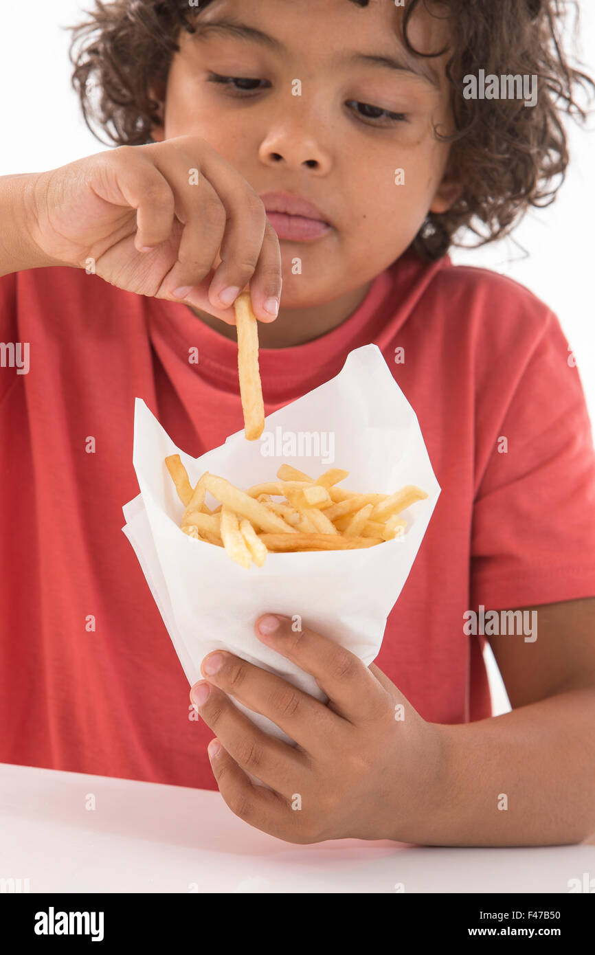 Child overweight eating hi-res stock photography and images - Alamy