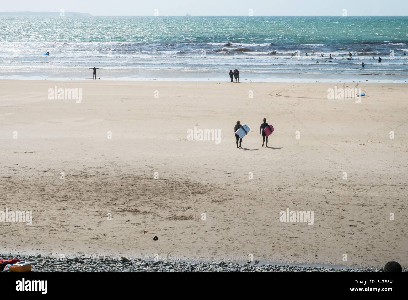 Newgale beach pembrokeshire surfer hi-res stock photography and images ...