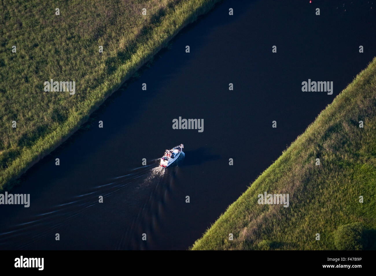 Boat in a channel hi-res stock photography and images - Alamy