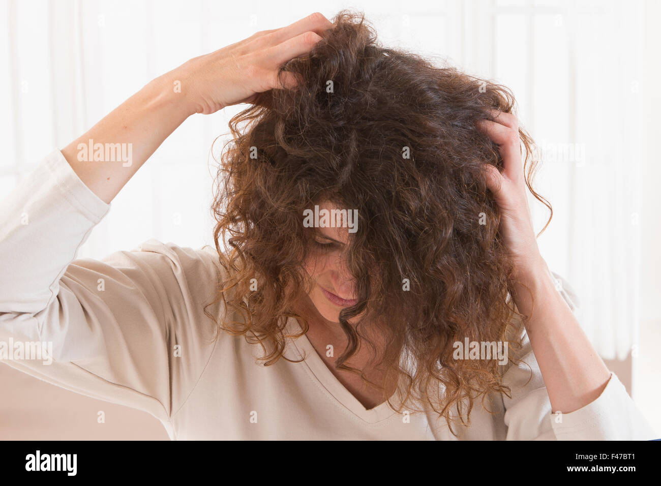 ITCHING IN A WOMAN Stock Photo - Alamy