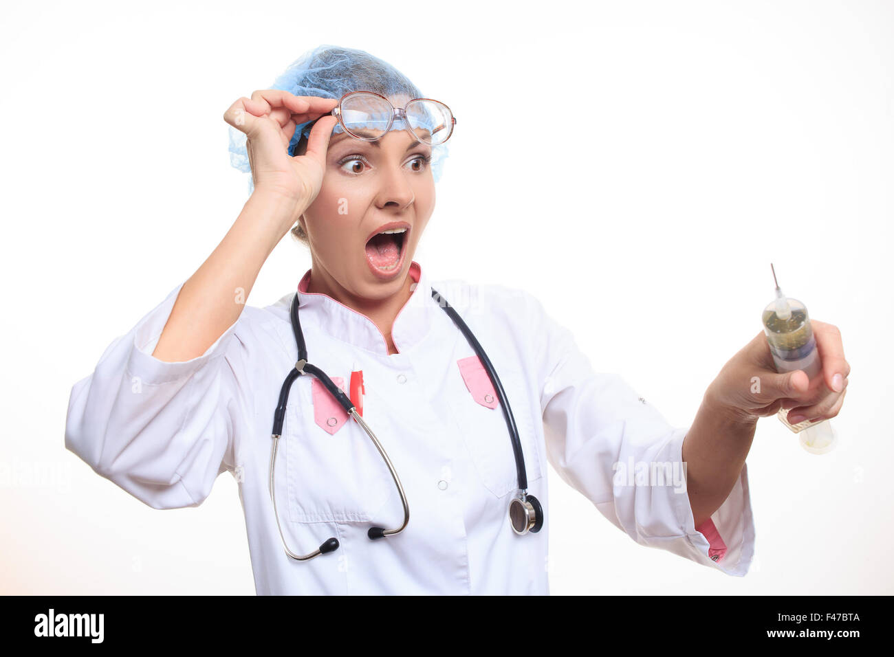 evil doctor with big syringe Stock Photo - Alamy