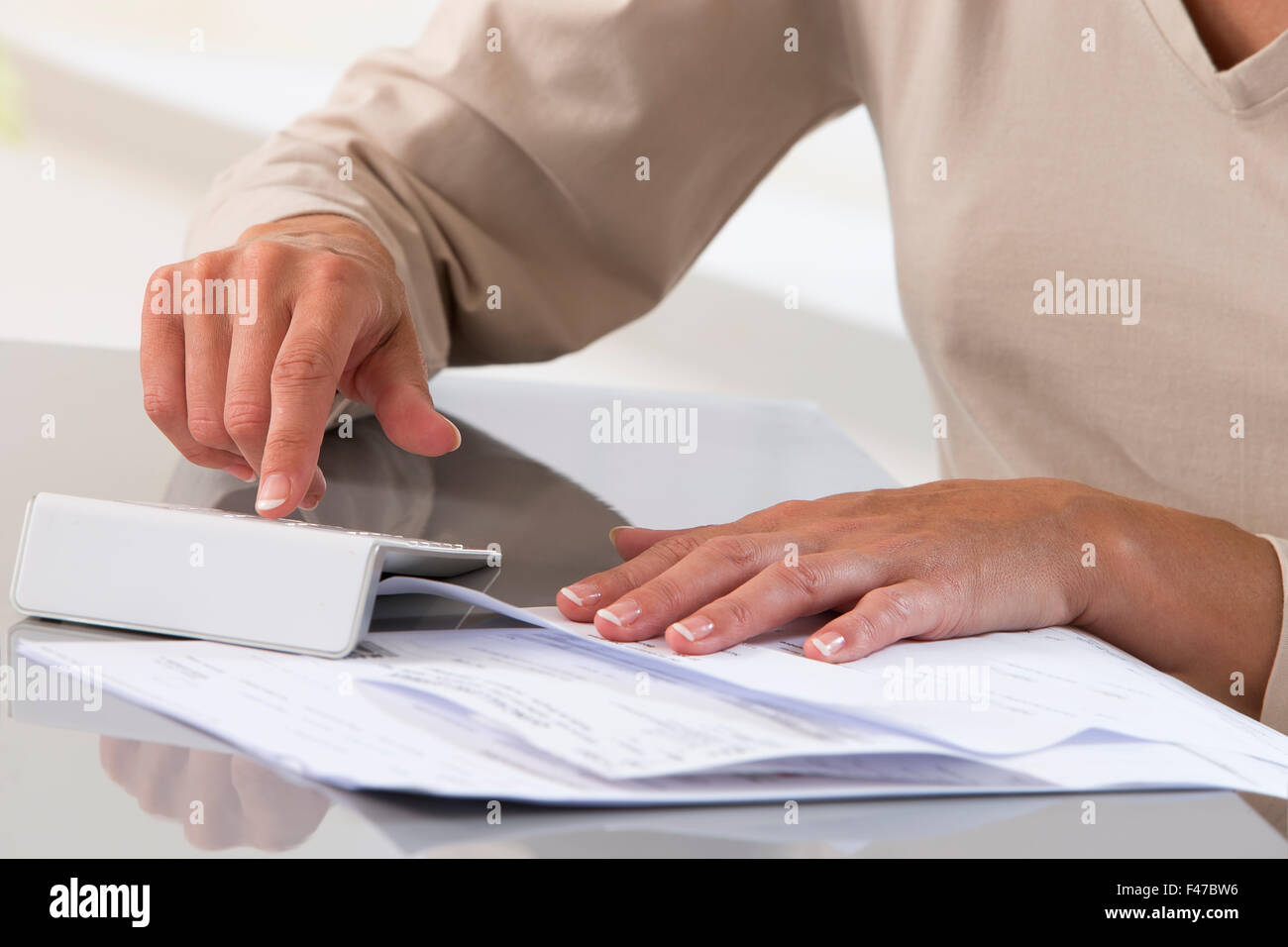 Woman doing her finances hi-res stock photography and images - Alamy