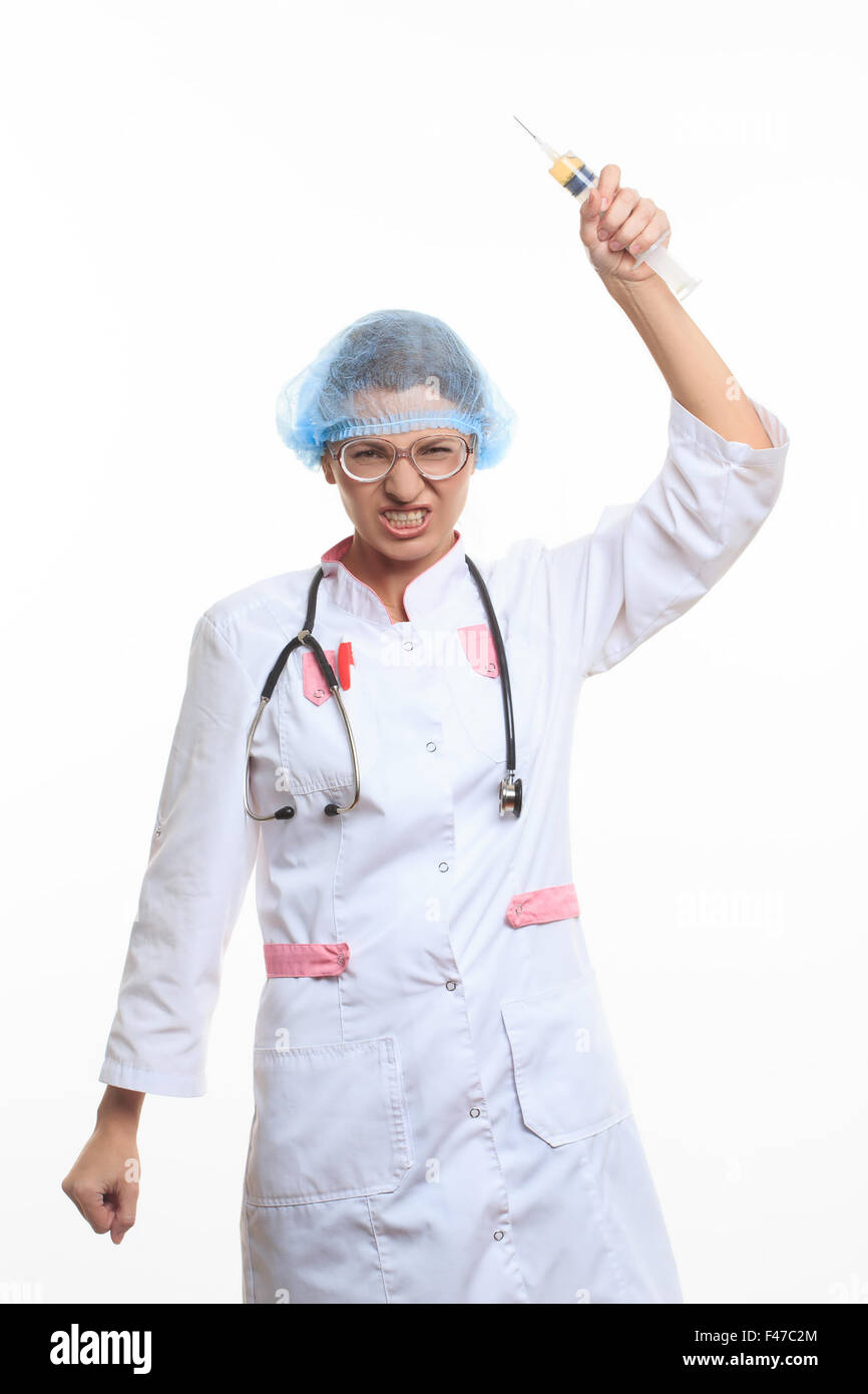 evil doctor with big syringe Stock Photo - Alamy