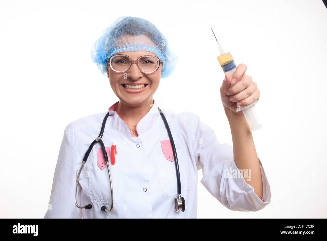 evil doctor with big syringe Stock Photo - Alamy