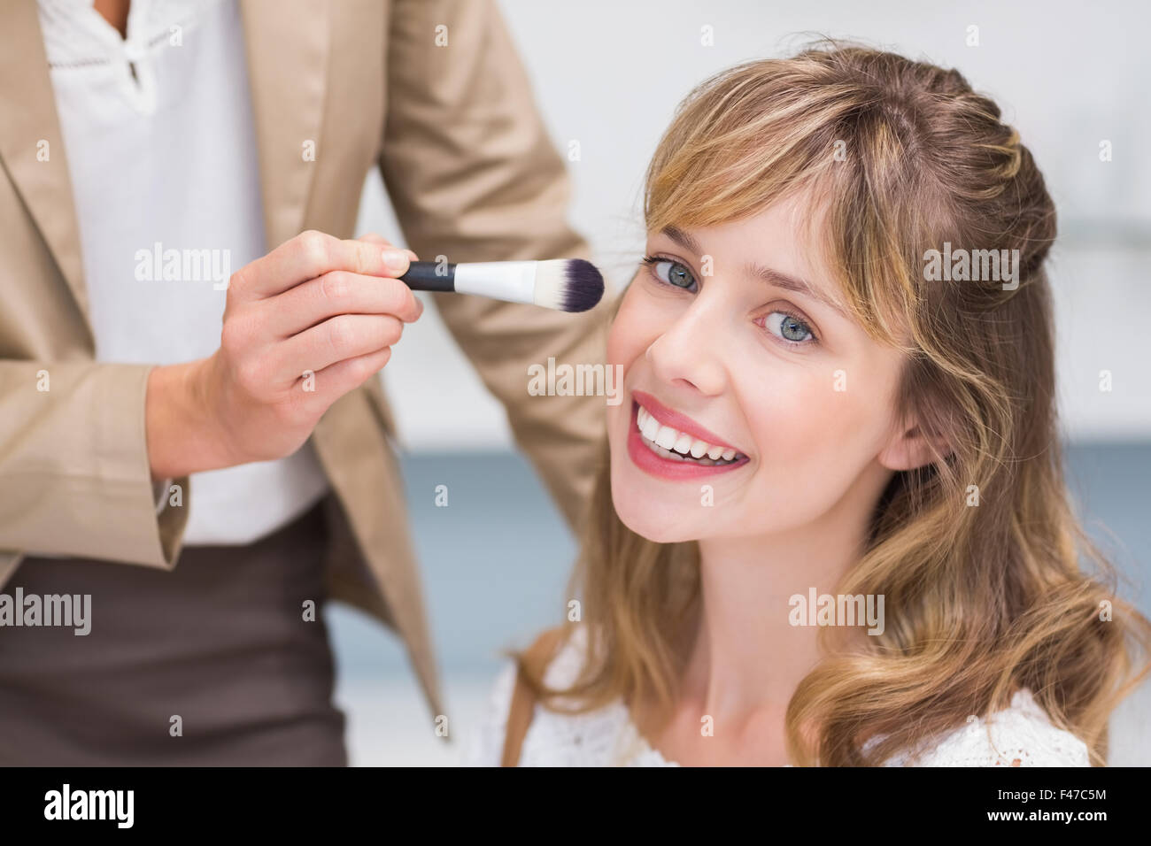 Beautiful woman getting makeup hi-res stock photography and images - Alamy