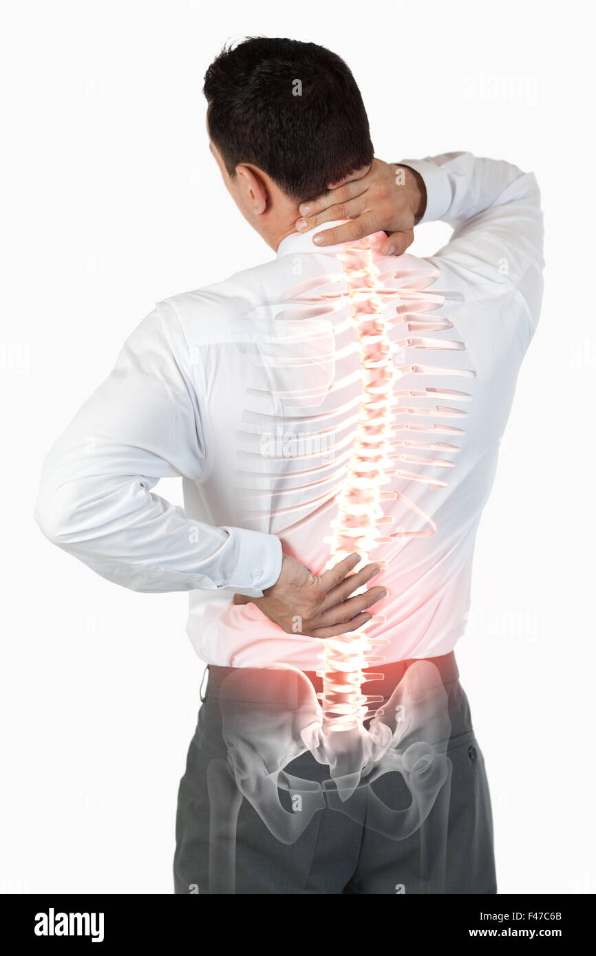 Highlighted spine of man with back pain Stock Photo - Alamy