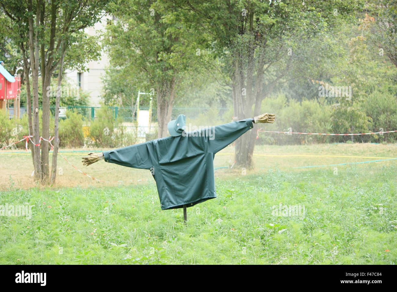 Scarecrow in the yard Stock Photo - Alamy