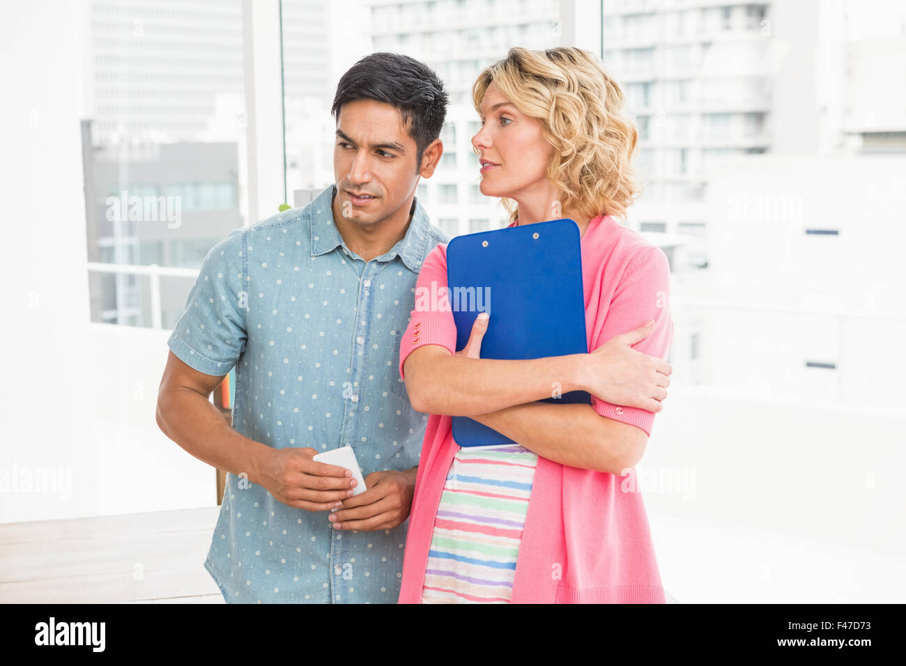 Colleagues standing and interacting Stock Photo - Alamy
