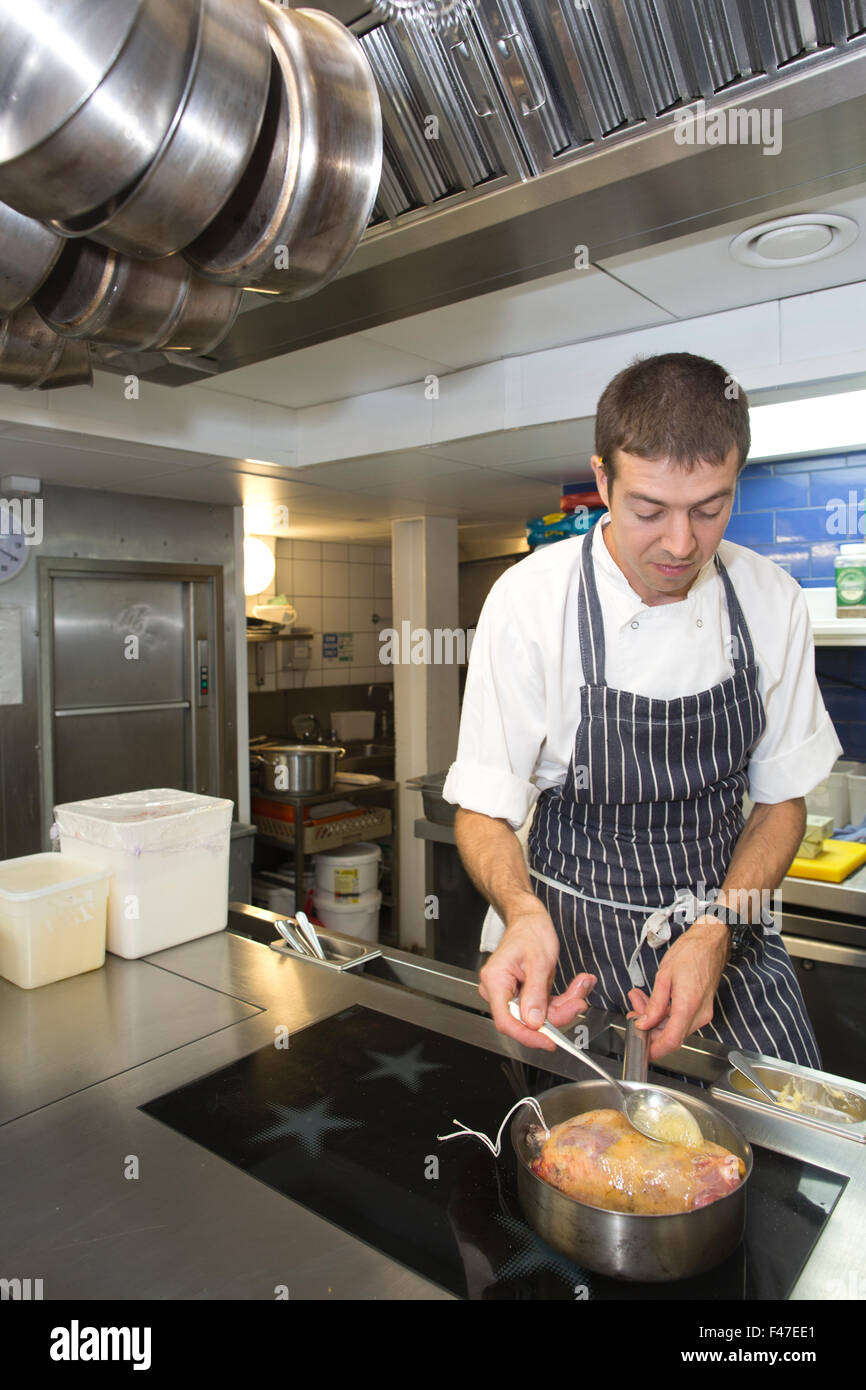Peter Weedon preparing roast pheasant, chef at Newman Street Tavern ...