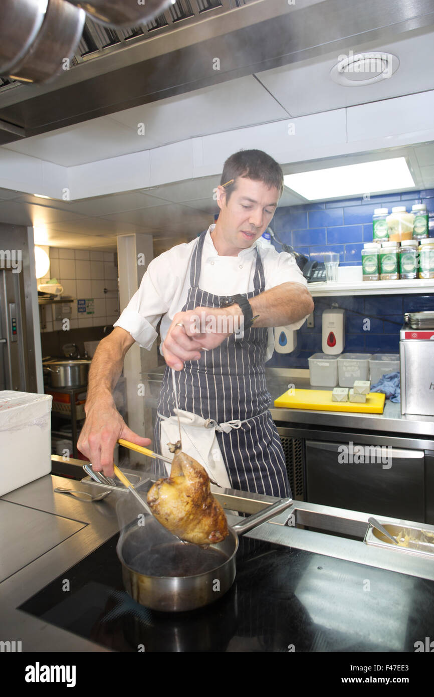 Peter Weedon preparing roast pheasant, chef at Newman Street Tavern ...