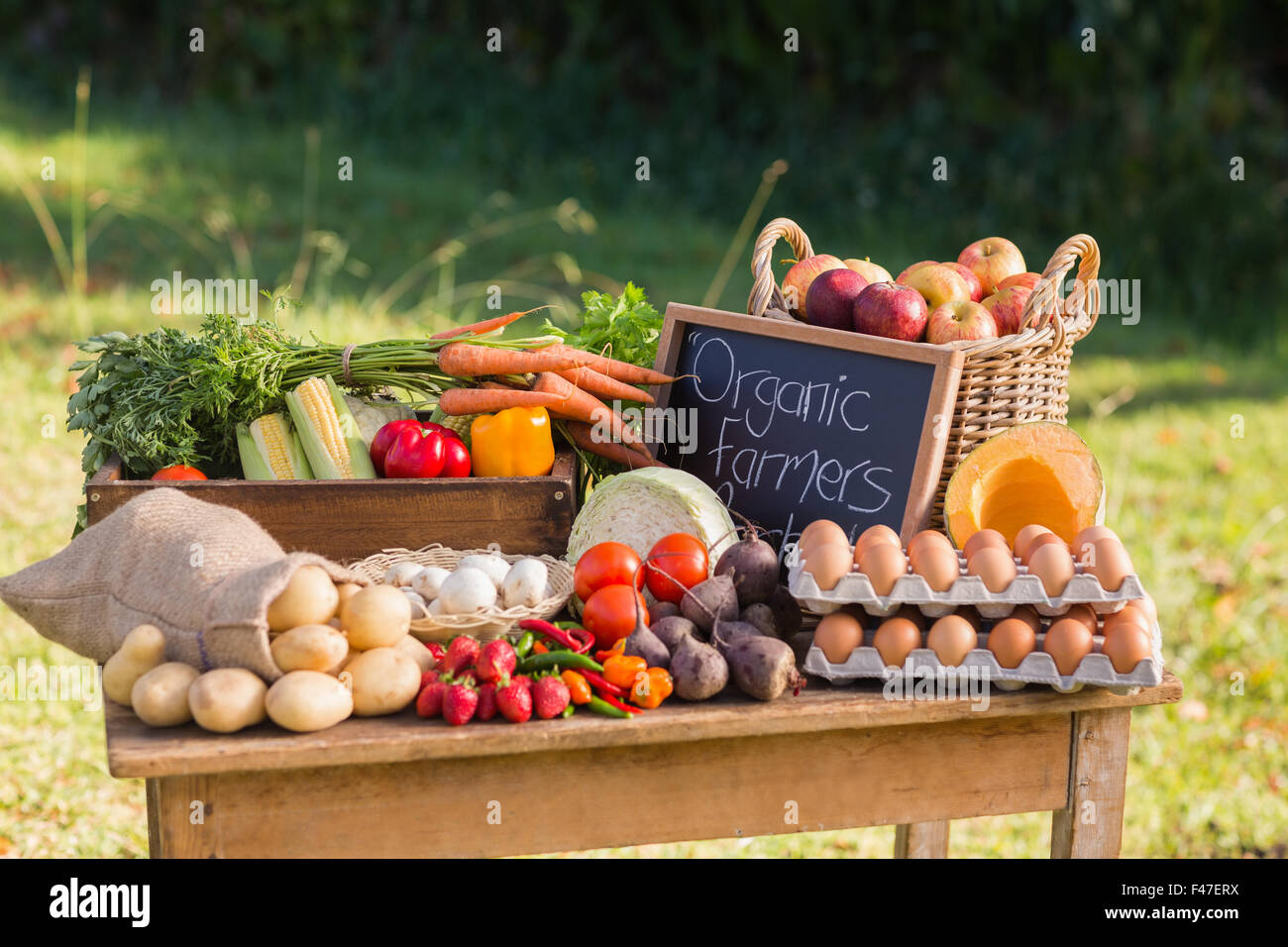Table of fresh produce at market Stock Photo - Alamy