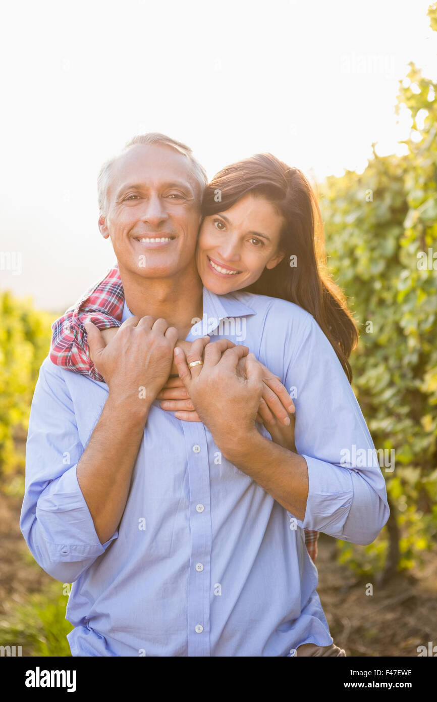 Putting arms around hi-res stock photography and images - Alamy