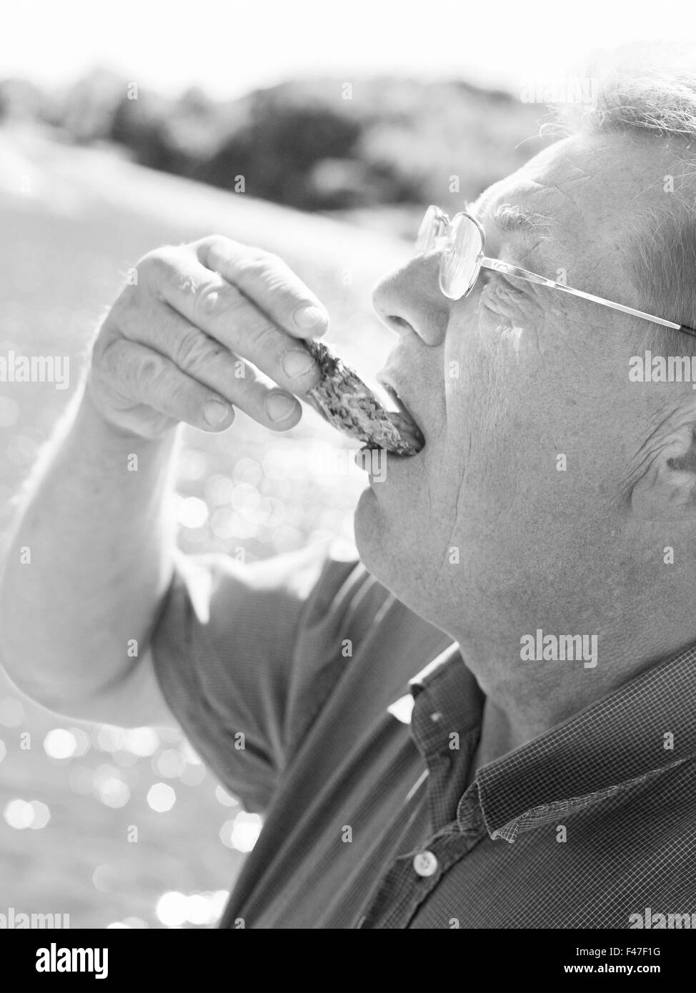 A man eating oysters, Sweden Stock Photo - Alamy