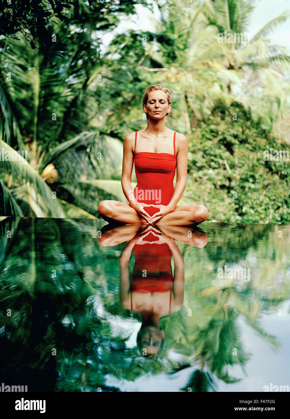 A Scandinavian woman practising yoga Stock Photo - Alamy