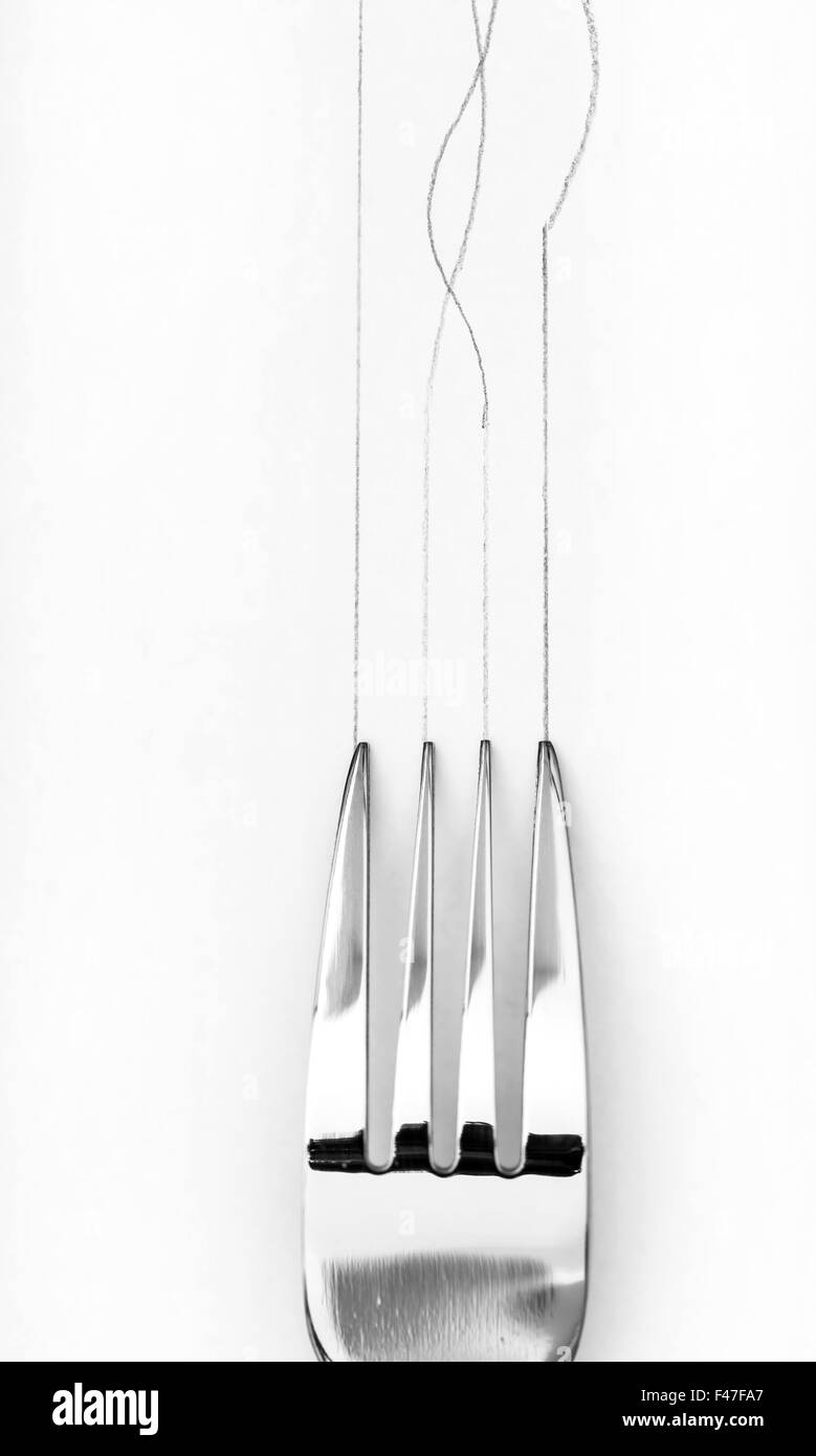 the cutlery, fork closeup on a white background Stock Photo - Alamy
