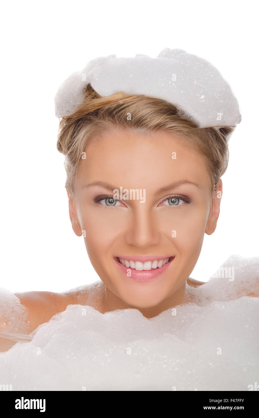 beautiful young woman in soapy foam Stock Photo - Alamy