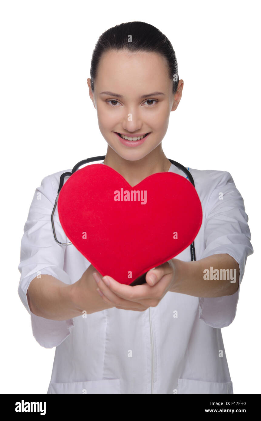 Doctor shows a red heart Stock Photo - Alamy