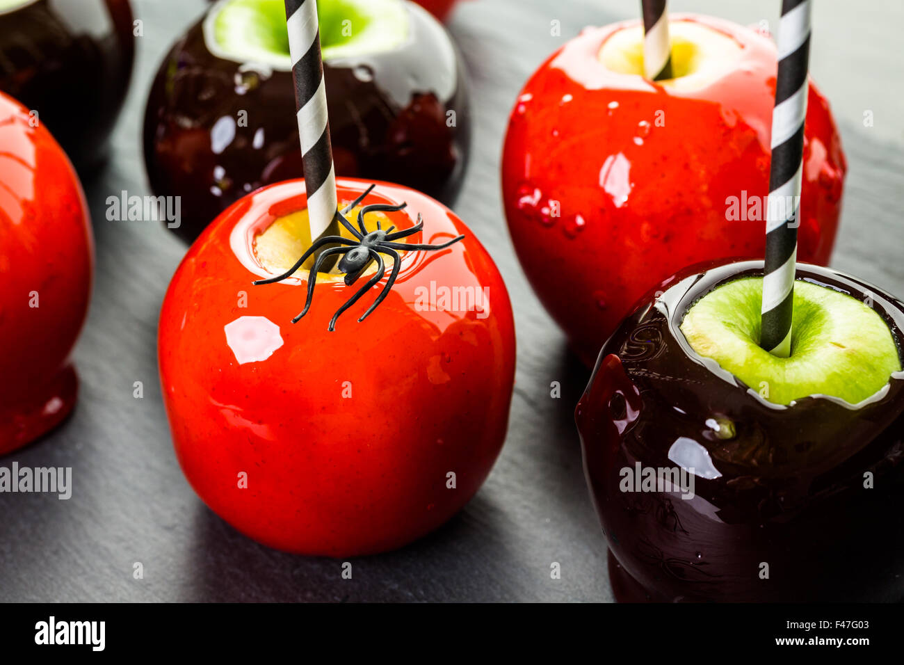 Handmade red candy apples for Halloween Stock Photo - Alamy