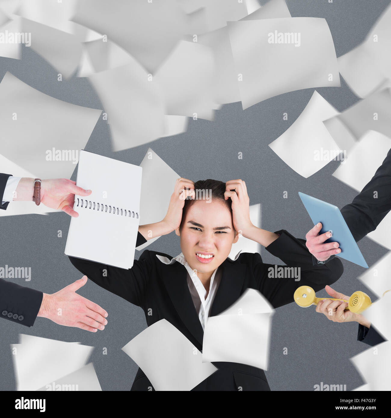 Composite image of hand holding notepad Stock Photo - Alamy
